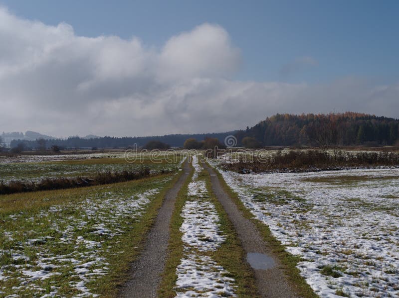 Snow on rural road stock photo. Image of freeze, field - 109404266