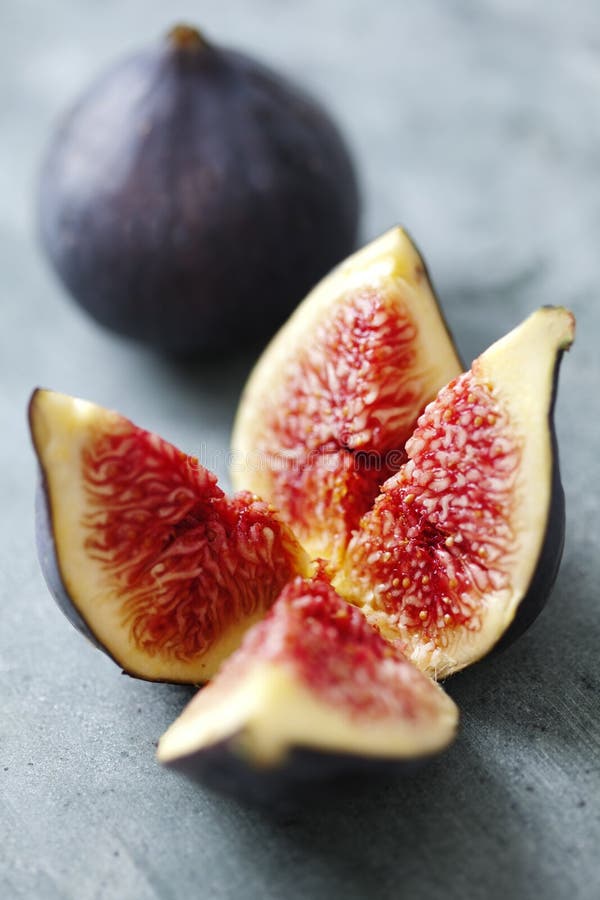 Fresh Fig Cut Open on a Stone Surface Stock Image - Image of sliced ...