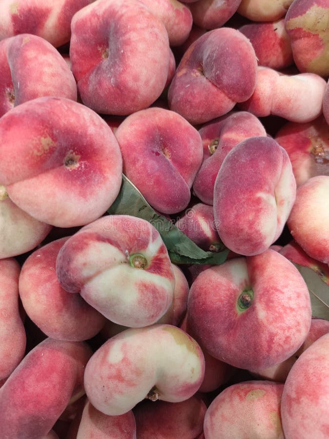 Fresh Fig Flat Peaches on the Counter Stock Photo - Image of peaches ...