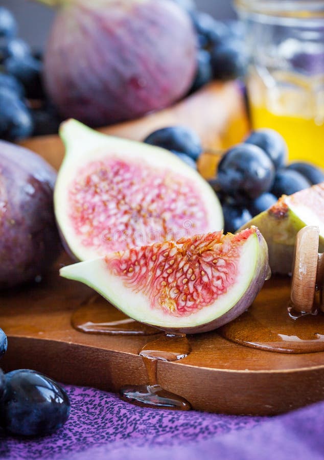 Fresh figs and dark grape stock photo. Image of autumnal - 46104296