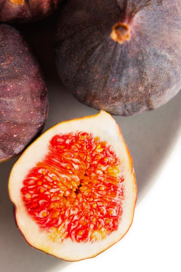 Fresh Figs on Grey Plate. Fruit with Half Isolated on White. Stock ...