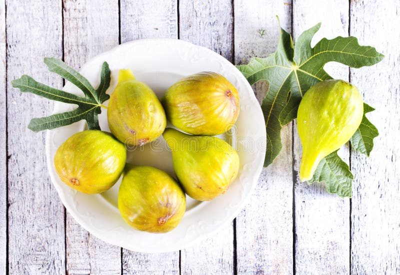 Fresh Figs on Plate on Wooden Table Stock Photo - Image of vegetarian ...