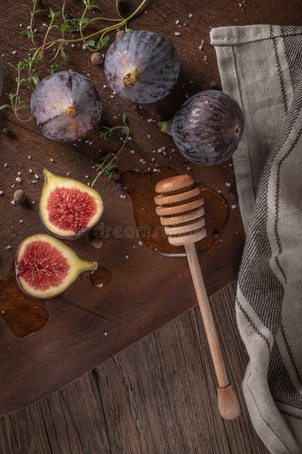 Fresh Figs. Whole Figs and Sliced in Half Figs on Wooden Cutting Stock ...