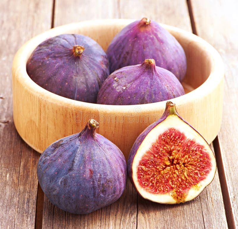 Fresh figs on wooden table stock image. Image of nature - 47241859
