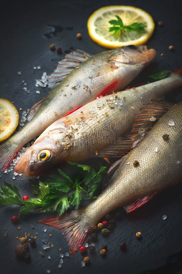 Fresh Fish with Aromatic Herbs, Spices, Salt. Raw Perches Stock Image ...