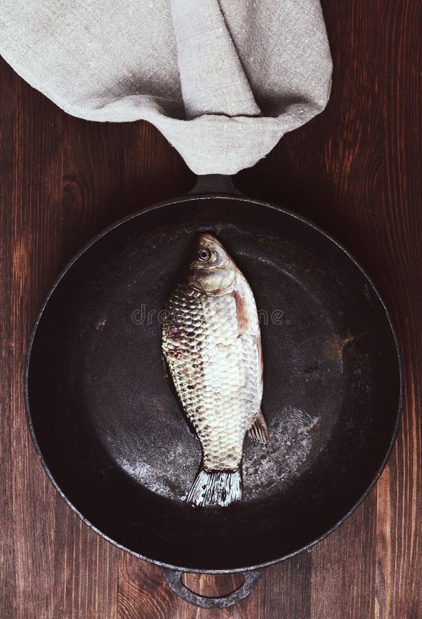 Fresh Fish Carp in a Black Frying Pan Stock Image - Image of kitchen ...