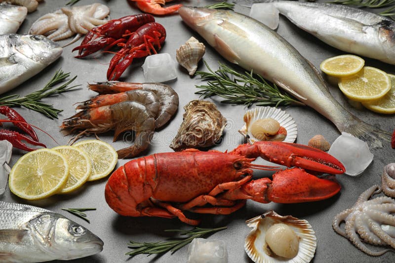 Fresh Fish and Different Seafood on Table Stock Photo - Image of ...