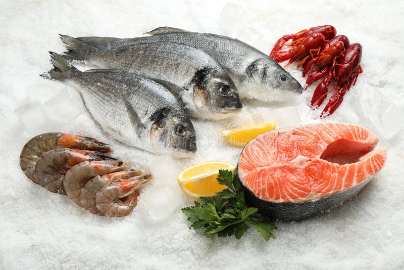 Fresh Fish and Seafood on Ice Stock Photo - Image of delicious, healthy ...