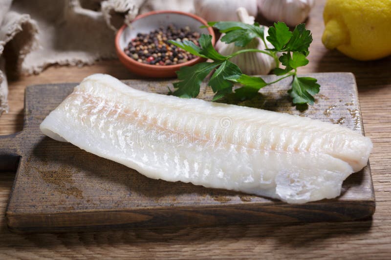 Fresh Fish Fillet of Cod with Ingredients for Cooking Stock Photo ...