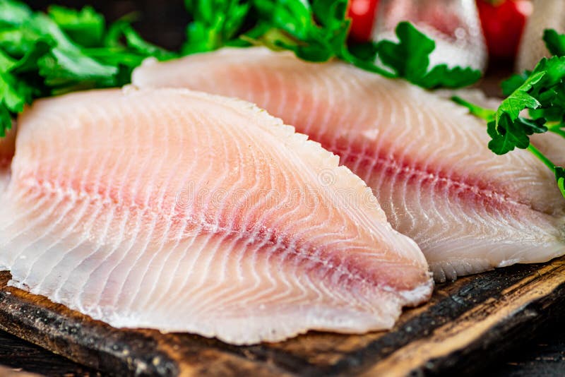 Fresh Fish Fillet on a Cutting Board. Stock Image - Image of protein ...