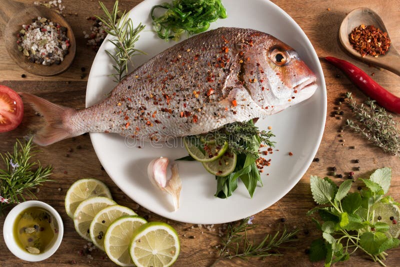 Fresh Fish with Herbs Filling Stock Photo - Image of fish, healthy ...