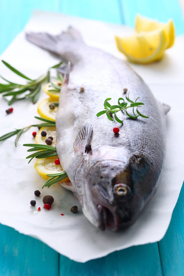 Fresh Fish with Lemon and Rosemary. Stock Image - Image of white ...