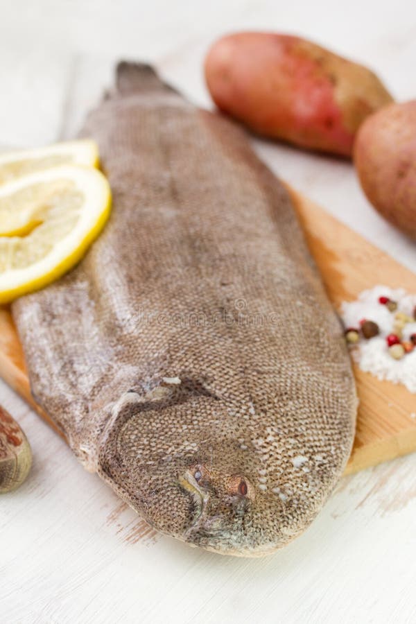 Fresh fish with potato stock image. Image of ingredient - 30505027