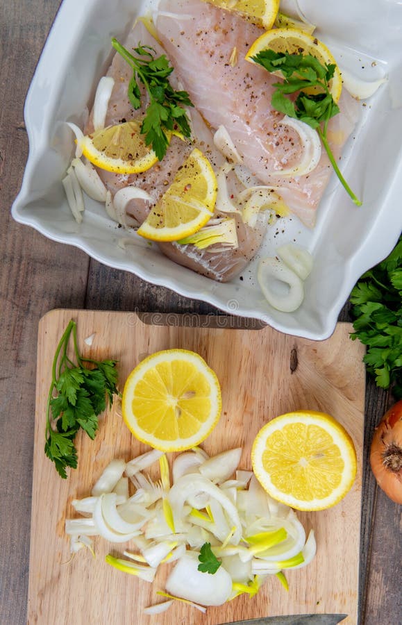 Fresh Fish, Raw Cod Fillets with Addition of Herbs and Lemon Stock ...