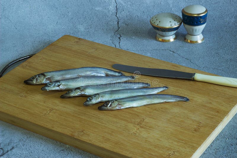 Fresh Fish with Salt and Spices on the Table Stock Photo - Image of ...