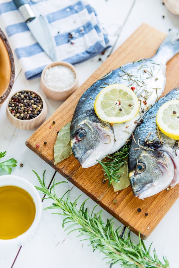 Fresh Fish Sea Bream Dorada on a White Table Stock Image - Image of ...