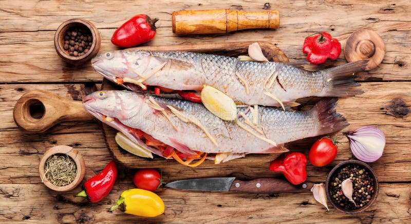Fresh uncooked fish stock photo. Image of diet, condiment - 133595394