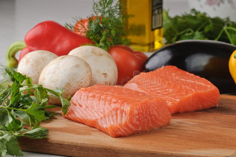 Fresh fish with vegetables stock photo. Image of kitchen - 17647242