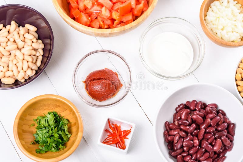 Fresh Food Ingredients on White Kitchen Table Stock Photo - Image of ...