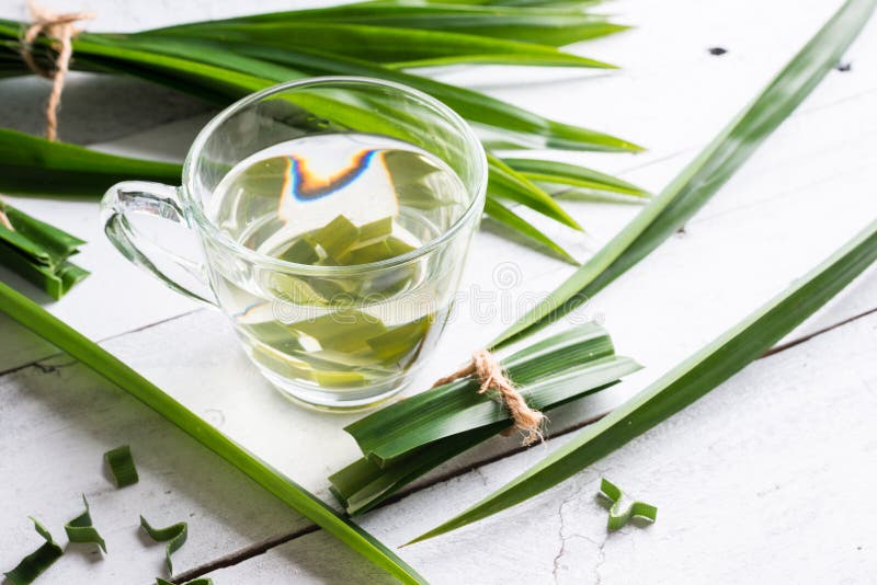 Fresh Fragrant Pandan Tea and Leaves on Wood Background Stock Photo ...