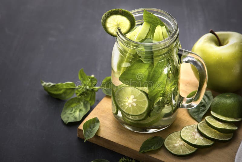 Fresh Fruit Flavored Infused Water Mix of Apple, Lime and Basil Stock ...