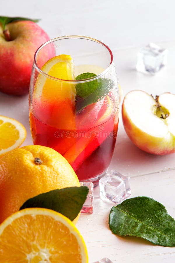 Fresh Fruit Punch with Orange and Apple Slice for Refreshment Stock ...