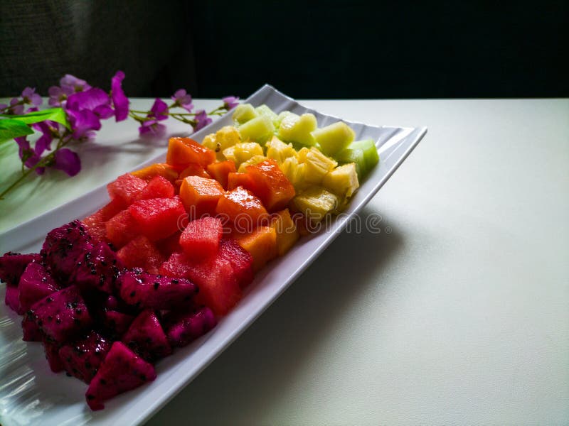 Fresh Fruit Salad on Rectangular White Plate Stock Photo - Image of ...
