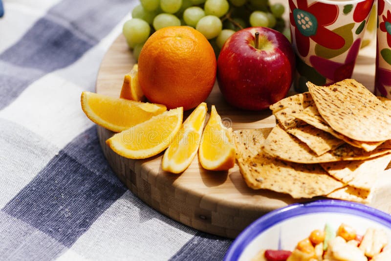 Fresh Fruit and Snacks on Picnic Blanket Stock Photo - Image of ...