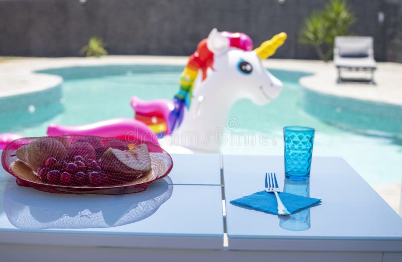 Fresh Fruit Tray Covered with Mesh for Insects, Waiting by the Pool ...