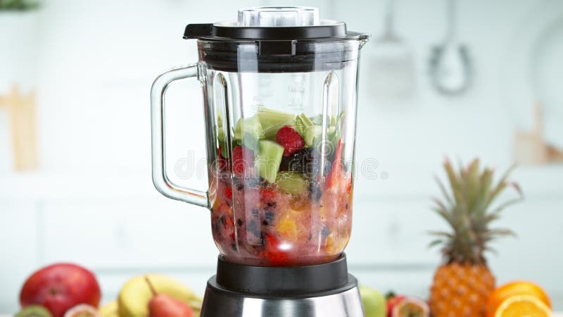 Fresh Fruit and Vegetables Smoothie Blended in Blender, Side View Stock ...