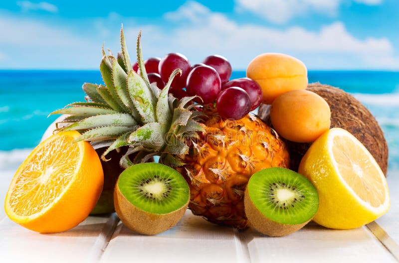 Fresh Fruits on the beach stock image. Image of delicious - 24379619
