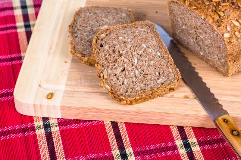Fresh full grain bread stock image. Image of kitchen - 164140833