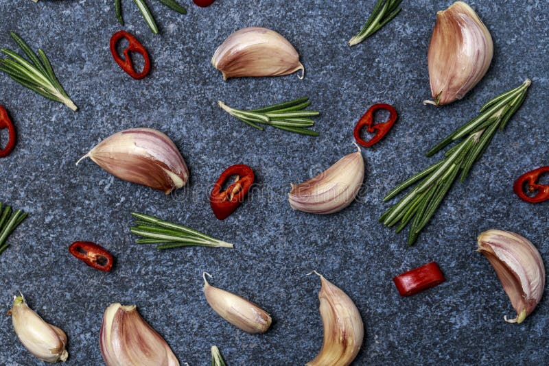 Fresh Garlic with Chili Pepper on Dark Background. Garlic Bulbs Stock ...