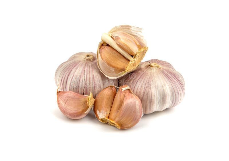 Fresh Garlic in Heads and Divided into Teeth on a White Isolated ...