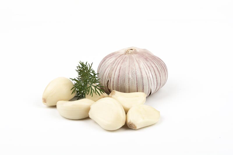 Fresh Garlic in Heads and Divided into Teeth on a White Isolated ...