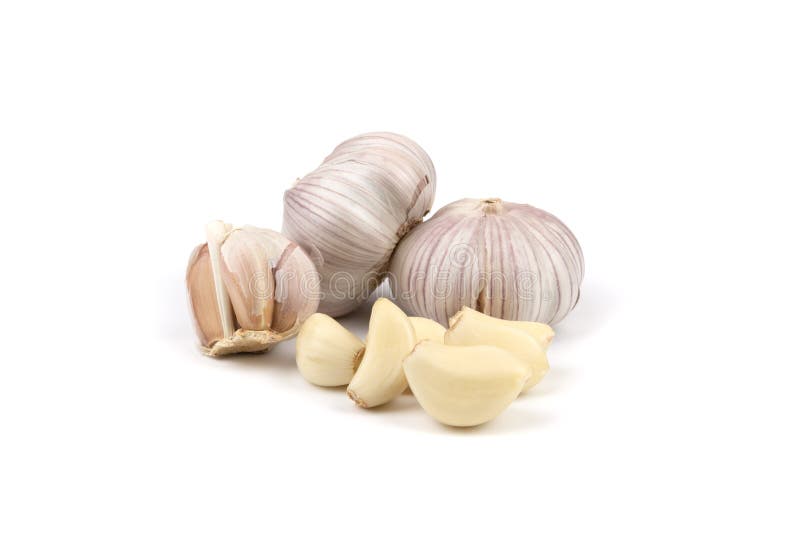 Fresh Garlic in Heads and Divided into Teeth on a White Isolated ...