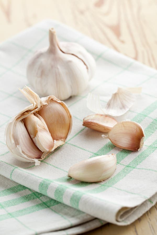 Fresh Garlic on Kitchen Table Stock Image - Image of taste, eating ...