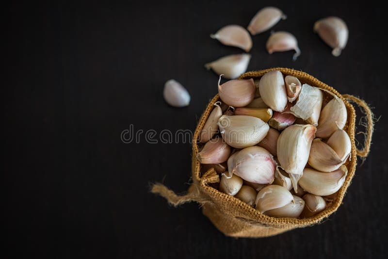 Fresh Garlic in Sack on Wood Table Stock Image - Image of nutrition ...