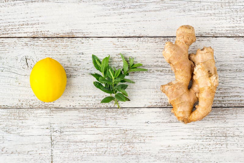 Fresh Ginger Lemon and Mint on White Wooden Background Stock Image ...