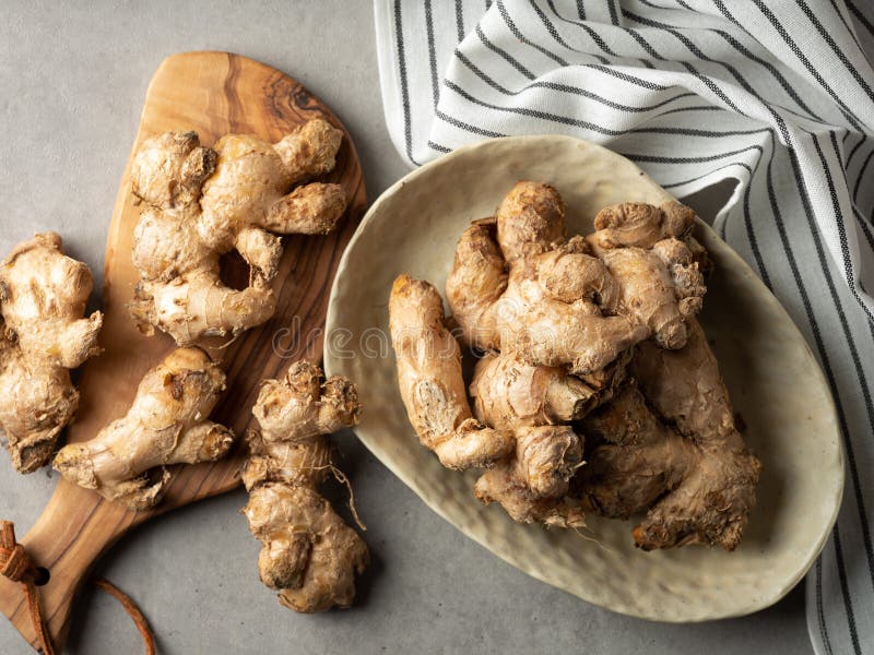 Fresh ginger on a plate stock photo. Image of dish, healthy - 265264378