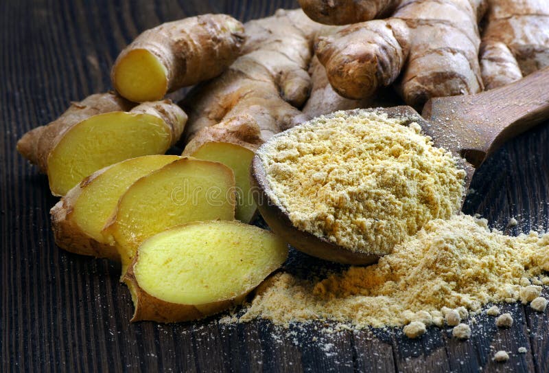 Fresh Ginger Root and Dry Ground Ginger in a Wooden Spoon. Powder ... Fresh Ginger Root and Dry Ground Ginger in a Wooden Spoon. Powder ...