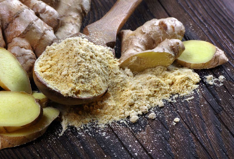 Fresh Ginger Root and Dry Ground Ginger in a Wooden Spoon. Powder ... Fresh Ginger Root and Dry Ground Ginger in a Wooden Spoon. Powder ...