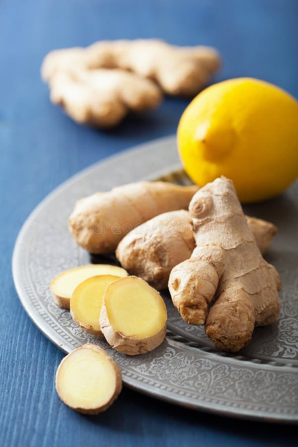 Fresh Ginger Root and Lemon on Vintage Plate Stock Image - Image of ...