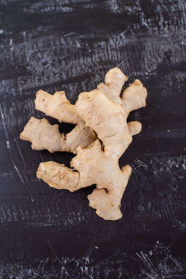 Fresh ginger root stock photo. Image of board, ingredient - 220137240