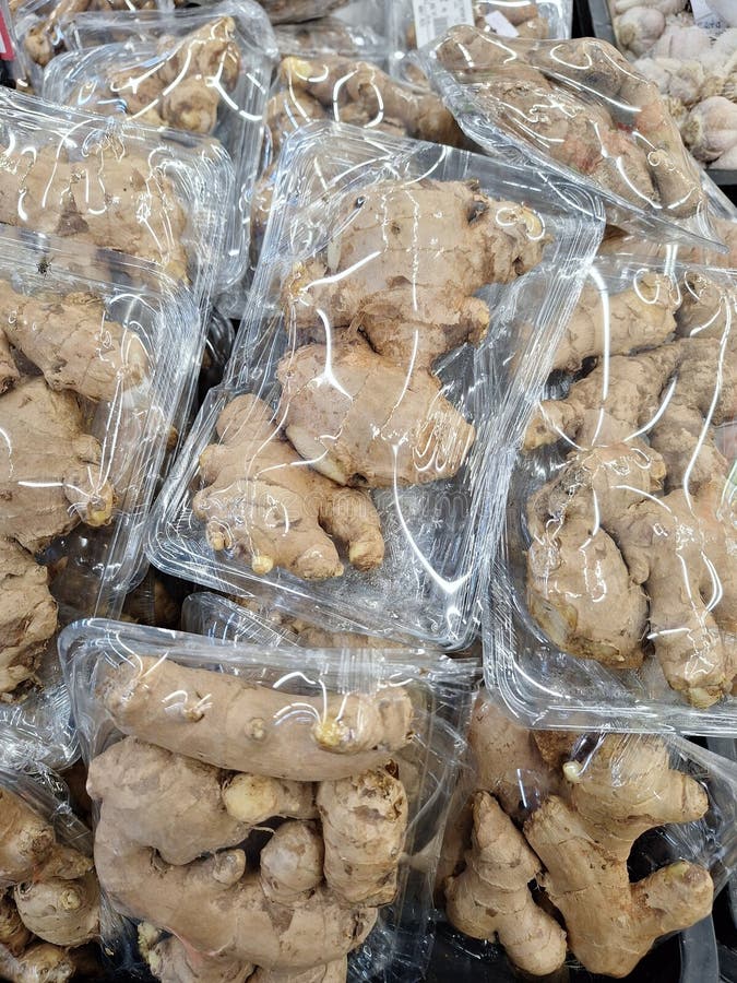 Close-Up of Multiple Packed Fresh Ginger Root in Transparent Wrapping ...