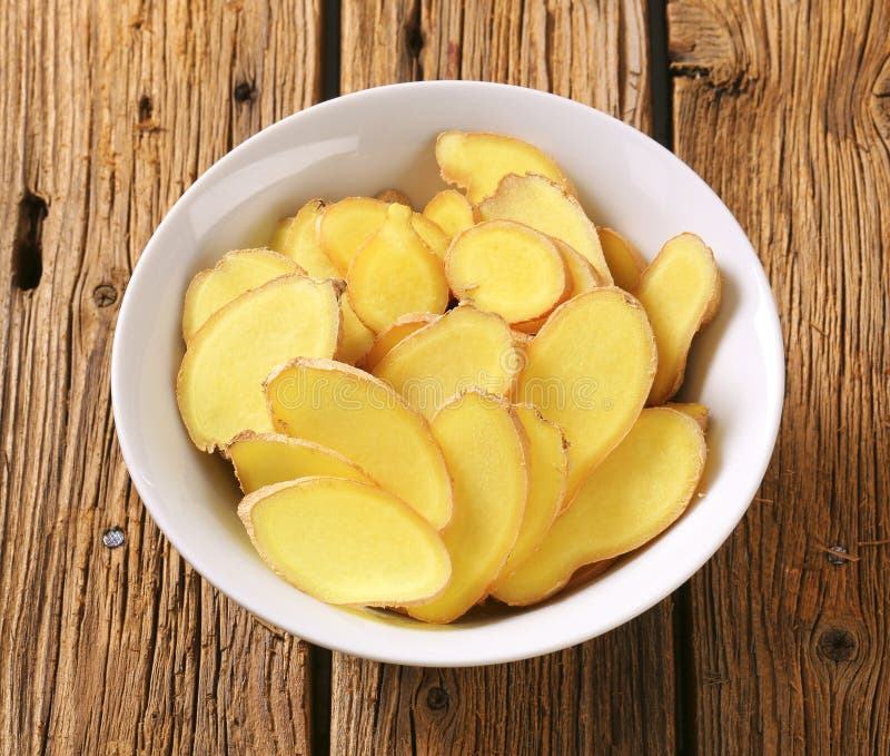 Ginger cut in slices stock image. Image of organic, slice - 32400641