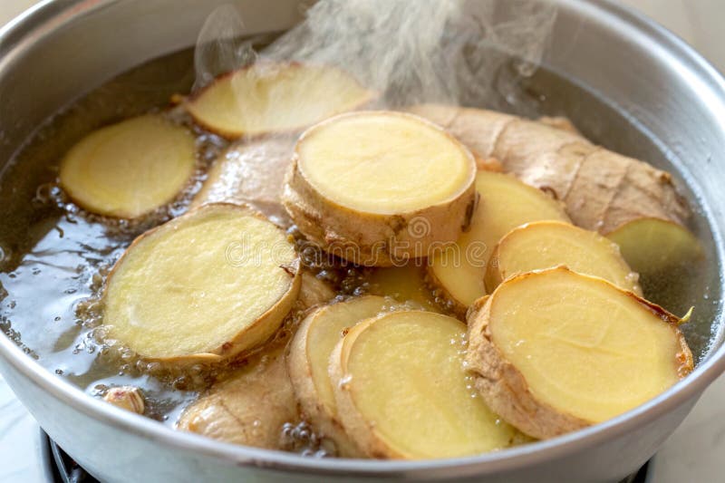 Fresh Ginger Slices Submerged in Hot Water Stock Illustration ...