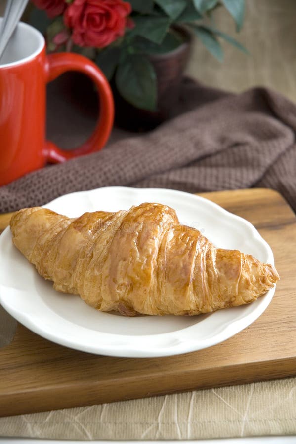Golden Croissant on a White Plate Stock Image - Image of cafe, crescent ...