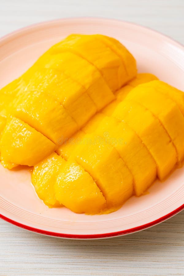 Fresh and golden mango stock photo. Image of food, nutrition - 196191812