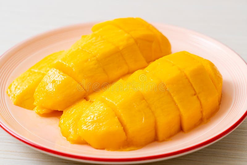Fresh and golden mango stock photo. Image of orange - 187338230